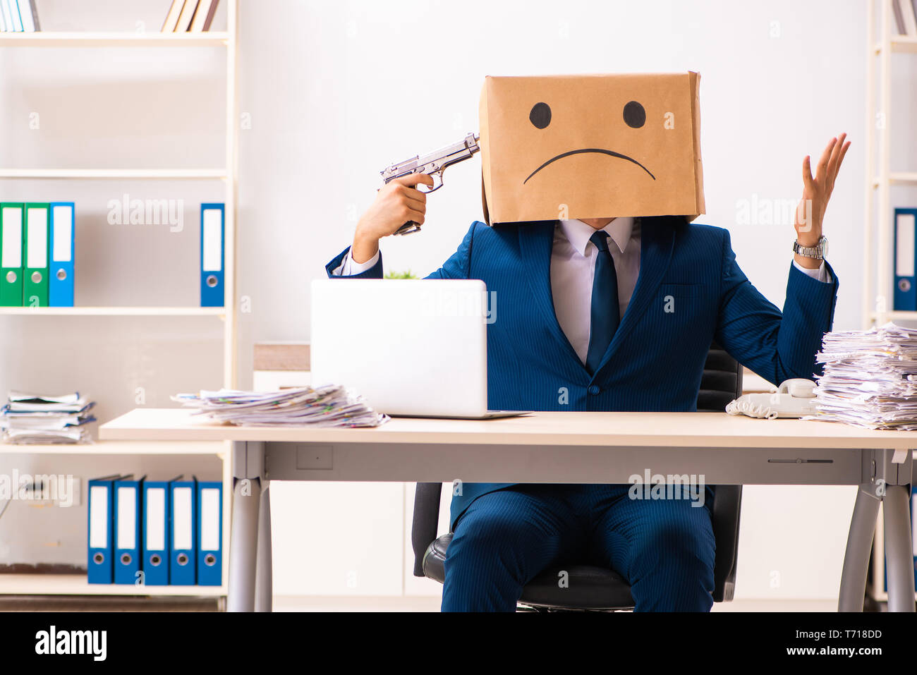 Unhappy man employee with box instead of his head Stock Photo - Alamy