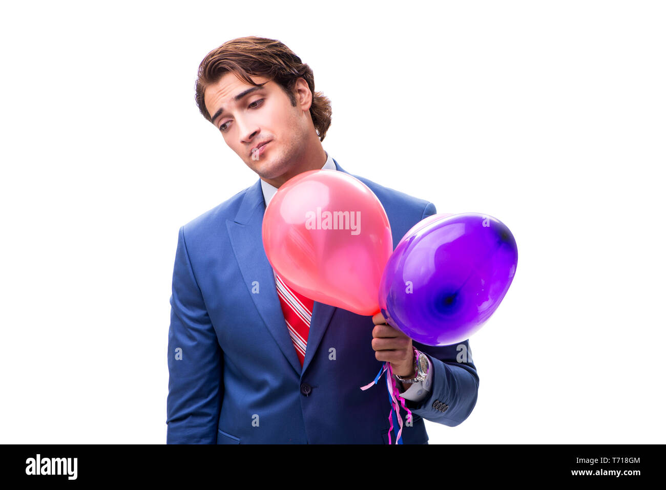 Elegant businessman with balloons isolated on white Stock Photo - Alamy