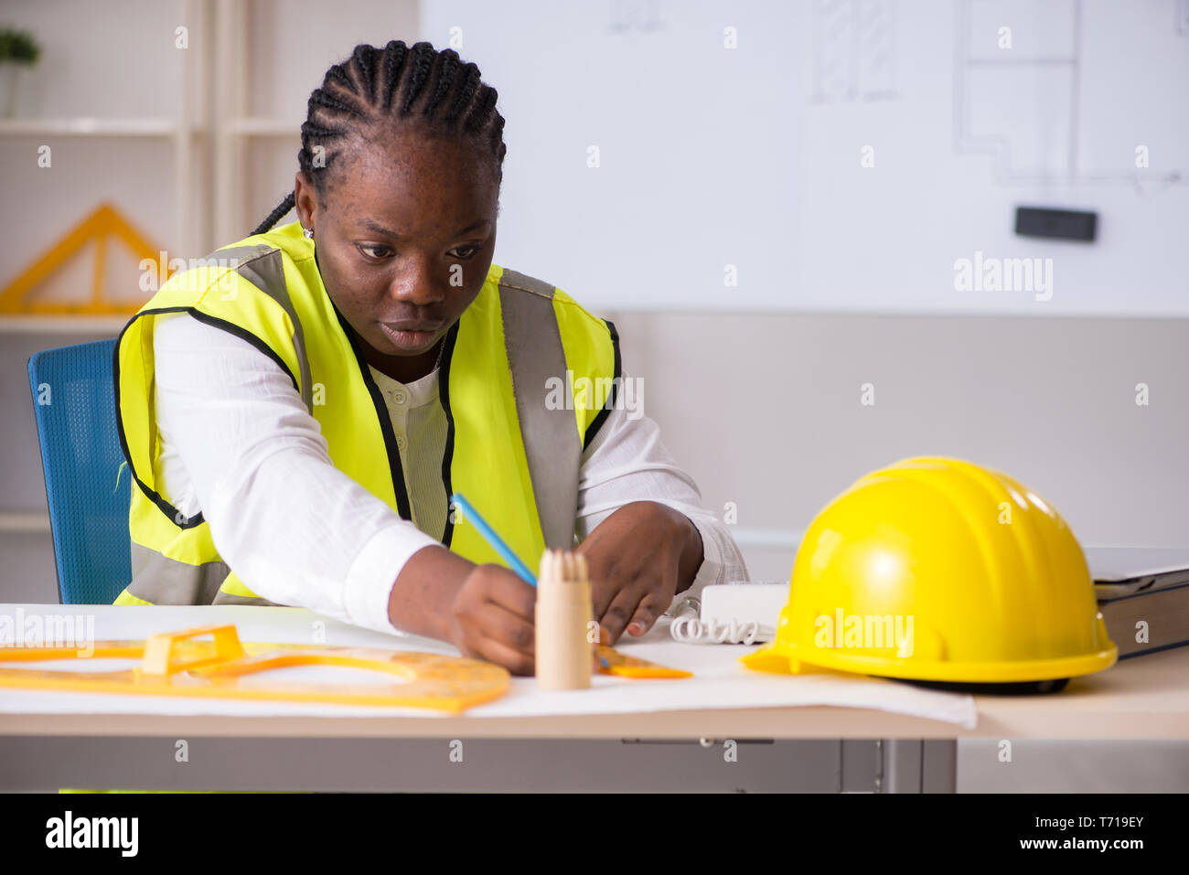 Young black architect working on project Stock Photo - Alamy