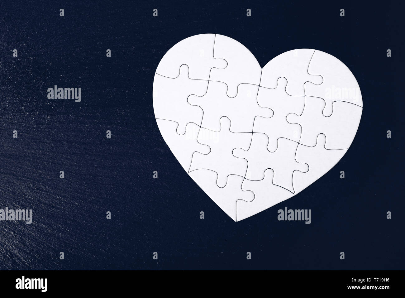 Heart object made of puzzle pieces. Make complete heart. Jigsaw puzzle ...
