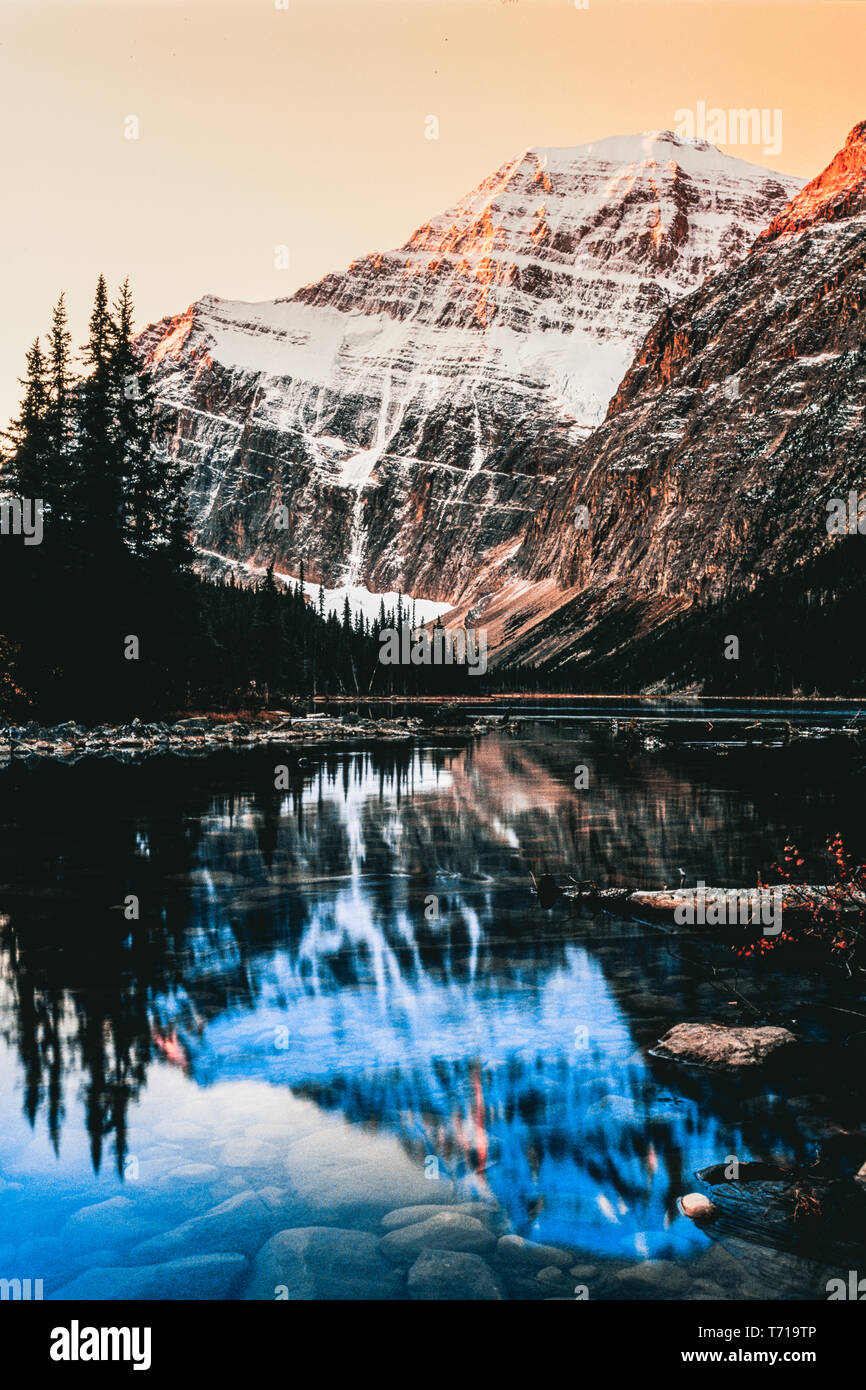 Mount Edith Cavell and Cavell Lake at Sunrise Stock Photo - Alamy