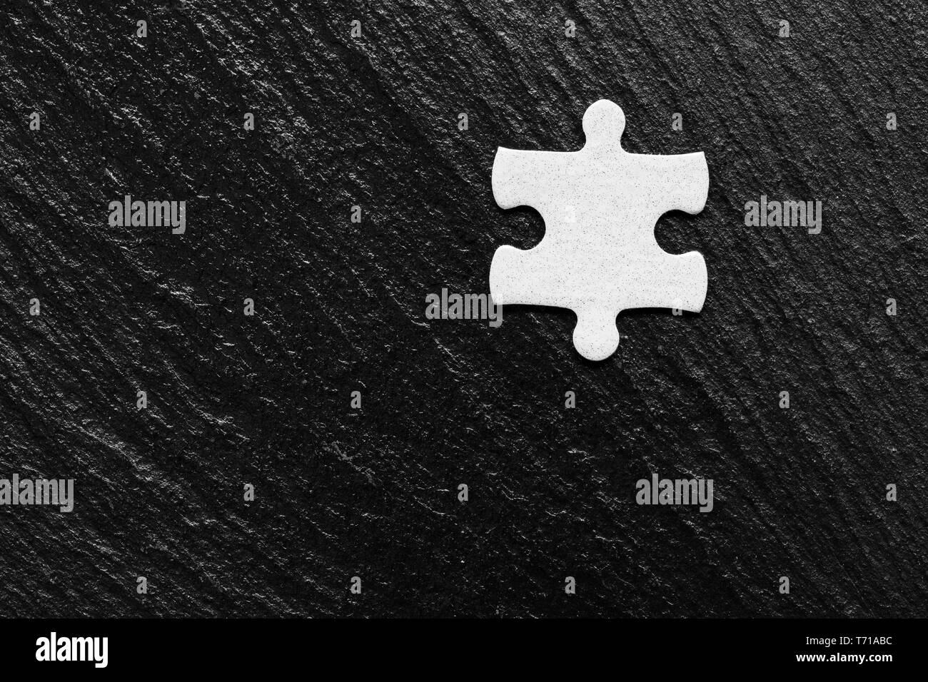 White jigsaw puzzle. White puzzle pieces on color background ...