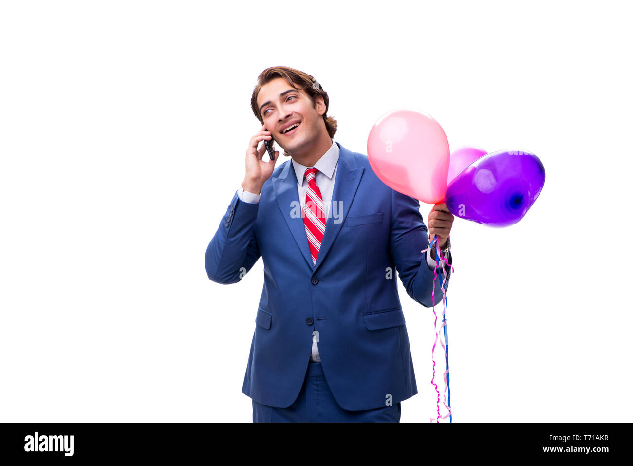 Elegant businessman with balloons isolated on white Stock Photo - Alamy