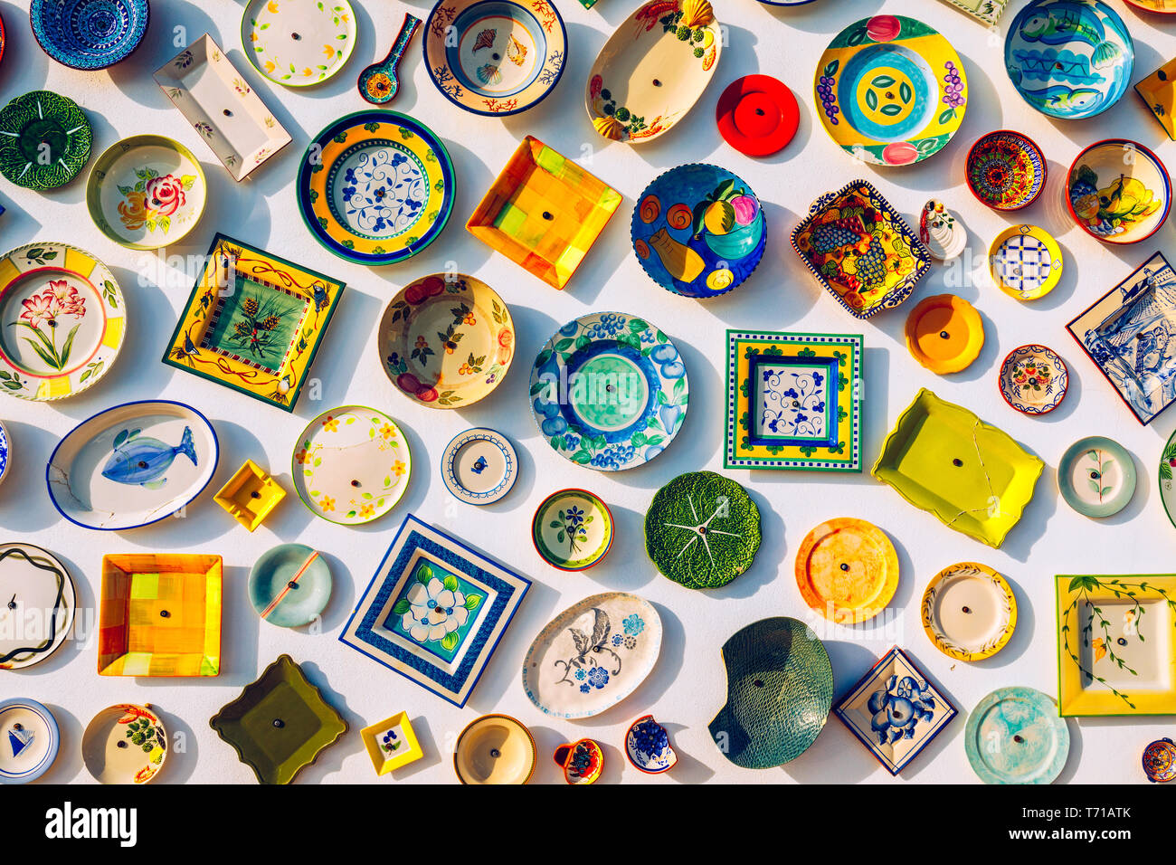 Collection of colorful Portuguese ceramic pottery, local craft products ...