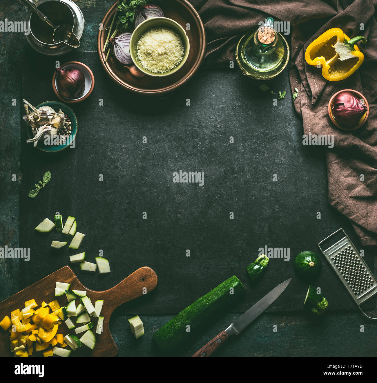 Dark rustic food background with vegetables and herbs on dark rustic ...