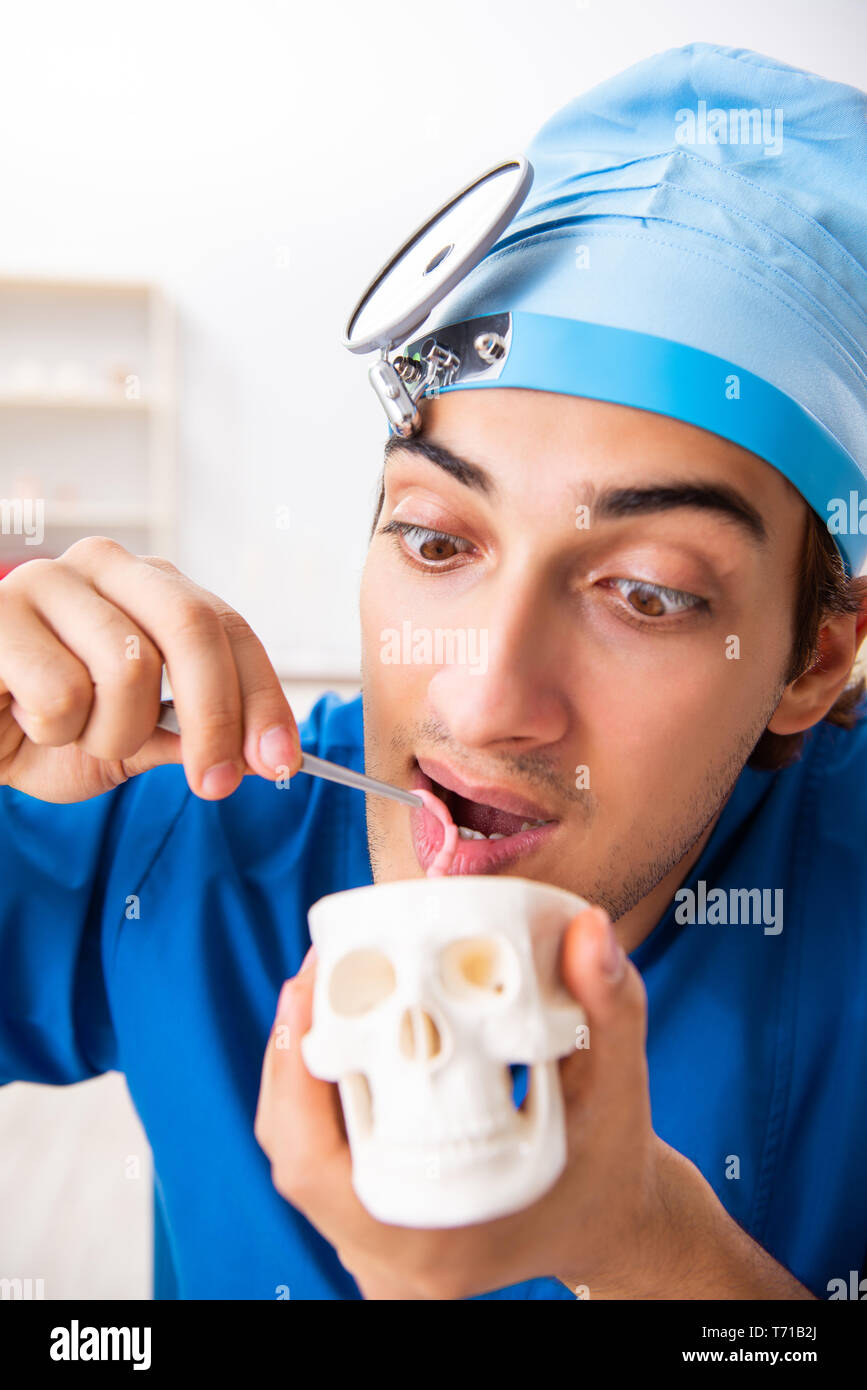 Mad doctor working in the clinic Stock Photo - Alamy