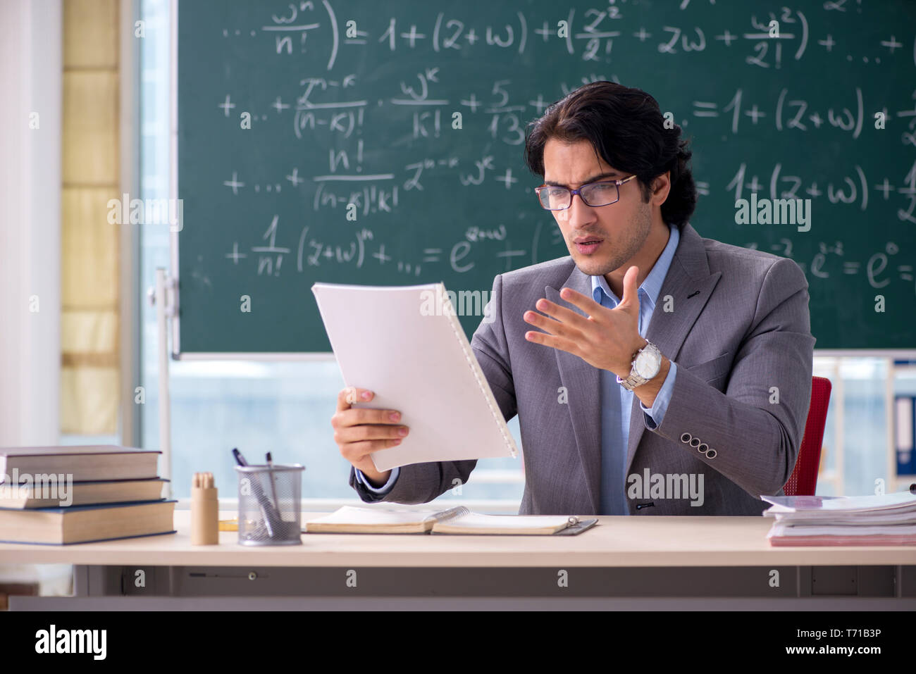 Young teacher physicist in hi-res stock photography and images - Alamy
