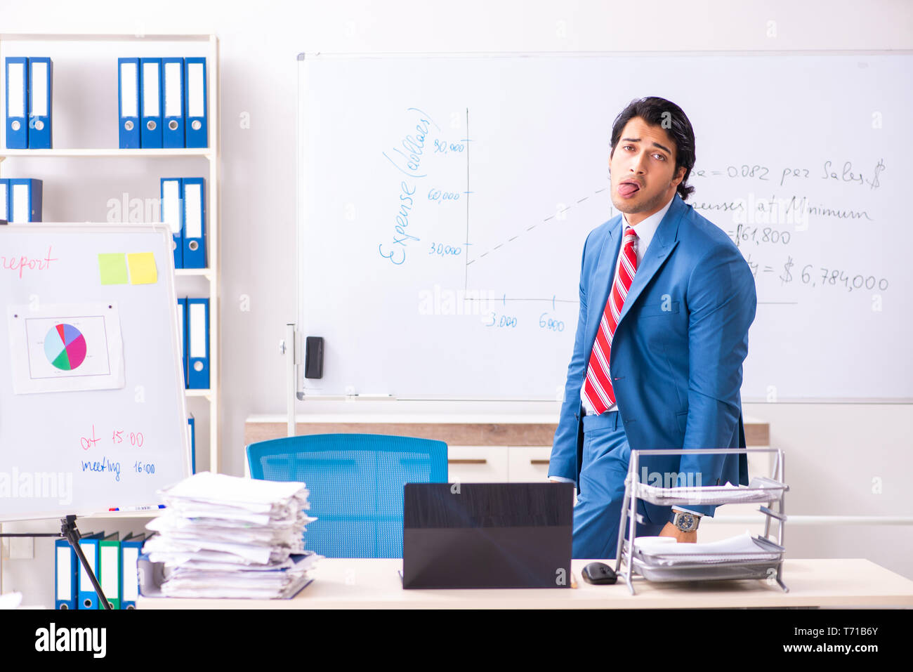 Workaholic man tired in front hi-res stock photography and images - Alamy