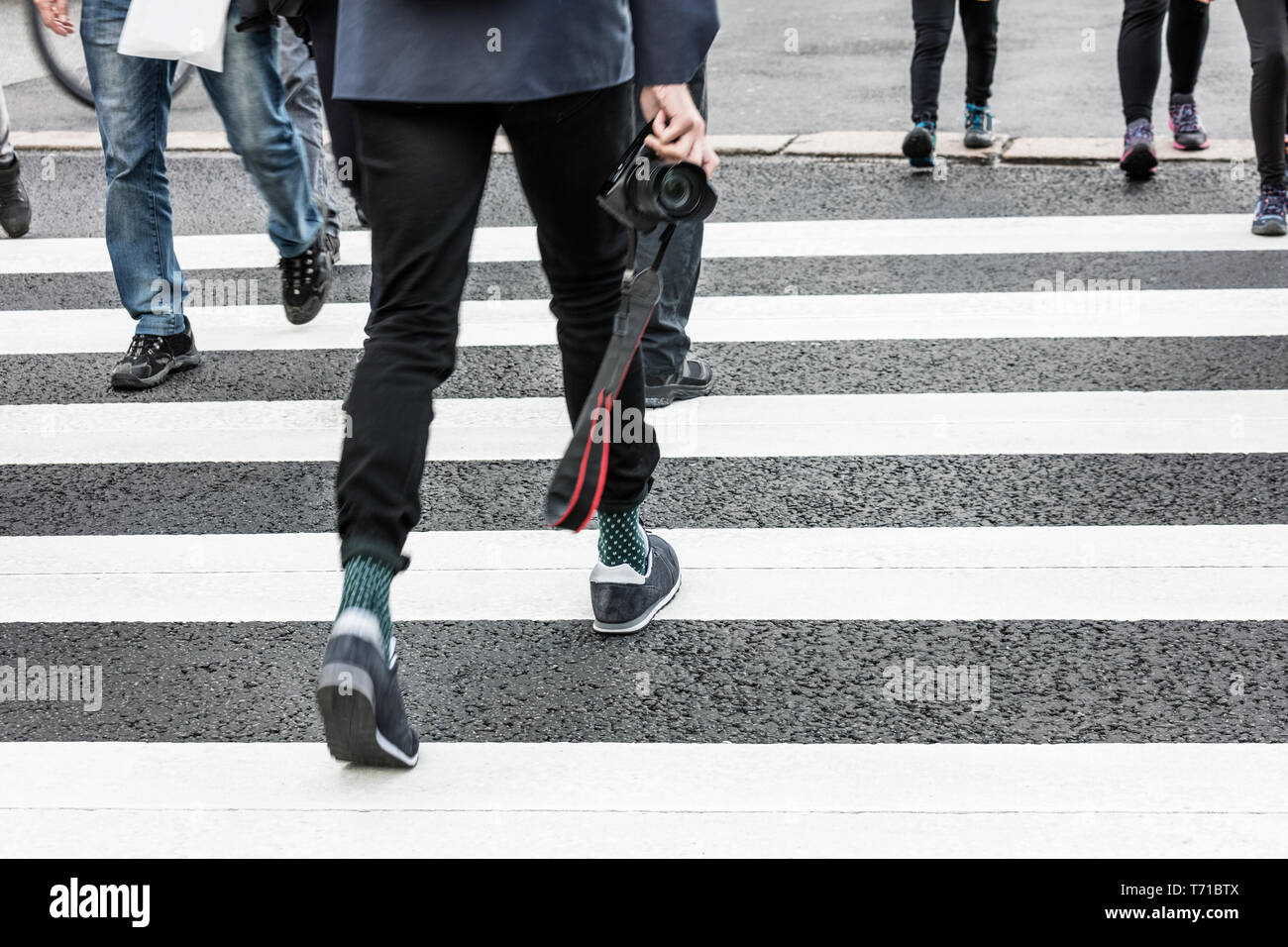 photographer at the pedestrian crossing Stock Photo - Alamy