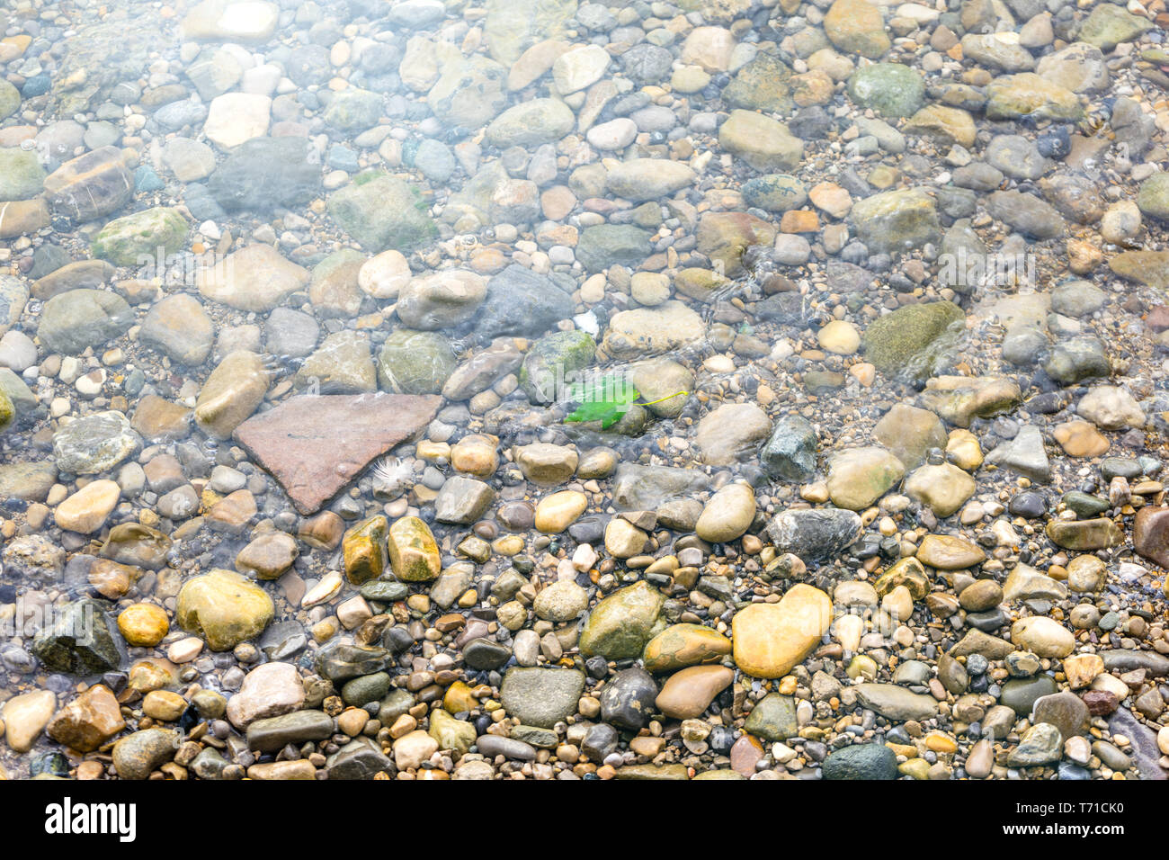 water pebbles background Stock Photo - Alamy
