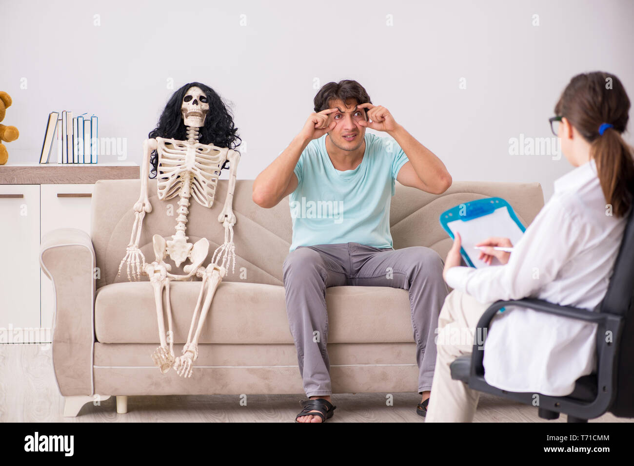 Young patient visiting psychologist for therapy Stock Photo - Alamy