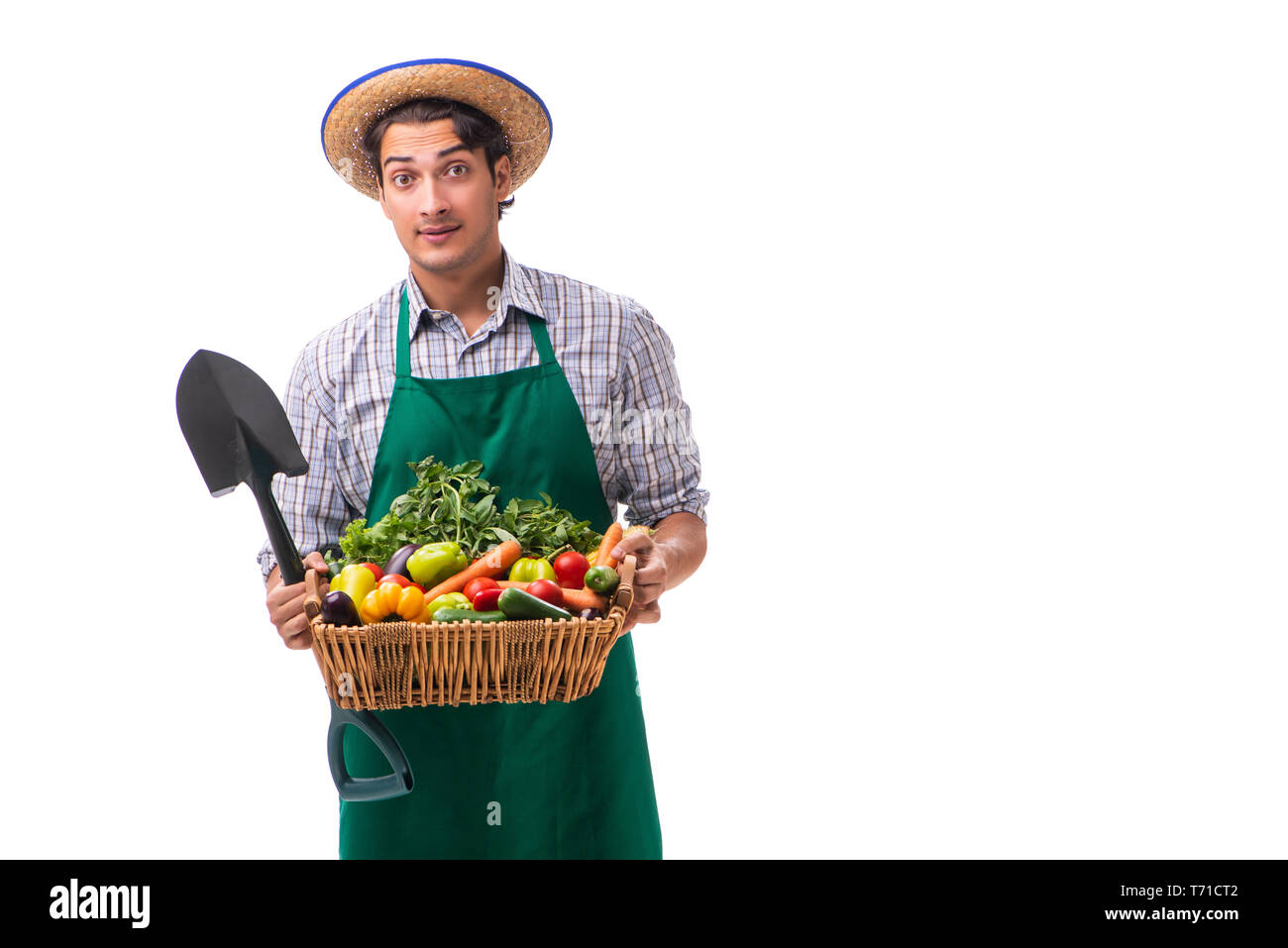 Young farmer with fresh produce isolated on white background Stock ...