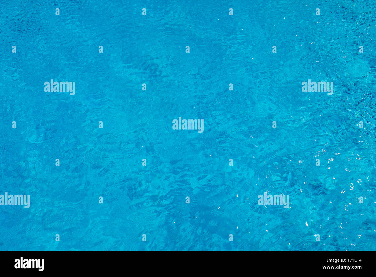 Blue ripped water in swimming pool. Surface of blue swimming pool ...