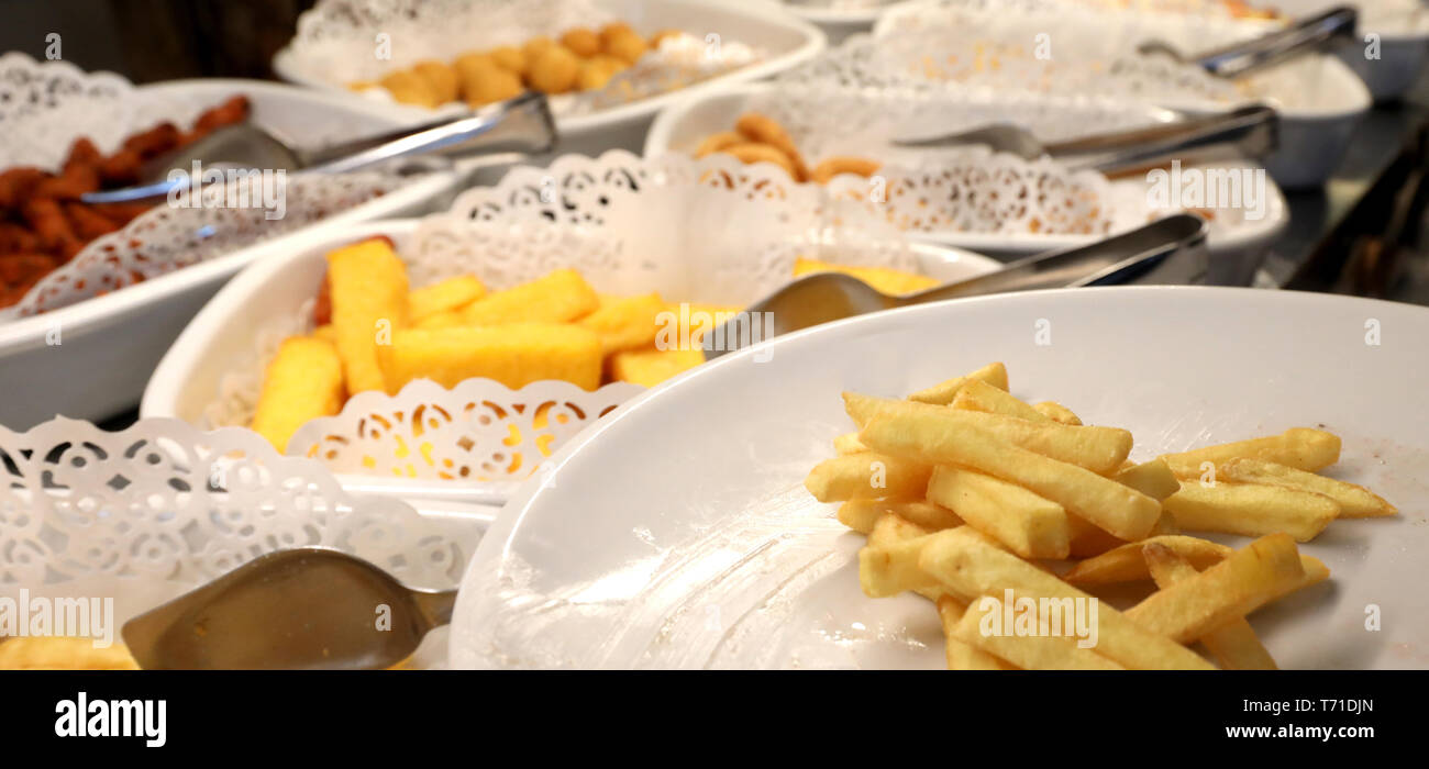 Inside a self service restaurant with many raw and cooked foods Stock ...
