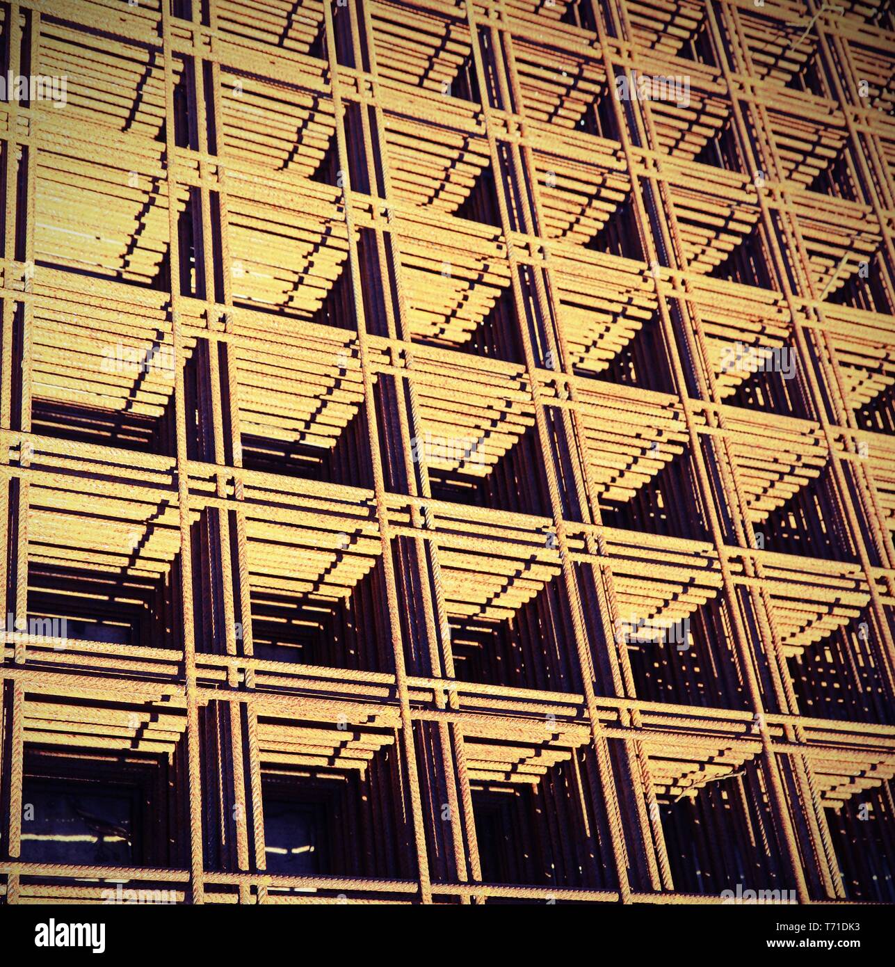 background of brown rusty welded mesh in the construction site with ...