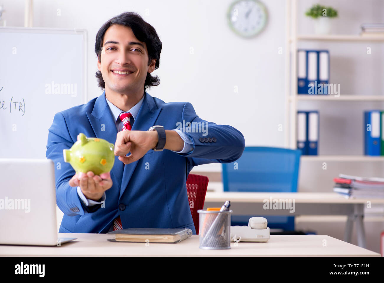Busy businessman explaining business charts Stock Photo - Alamy