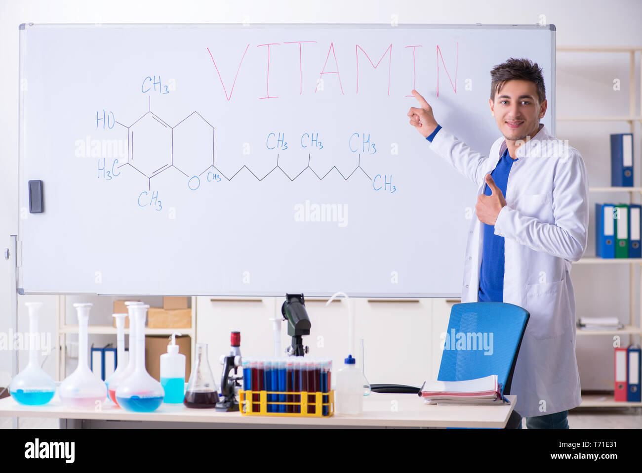 Scientist standing in front whiteboard hi-res stock photography and ...
