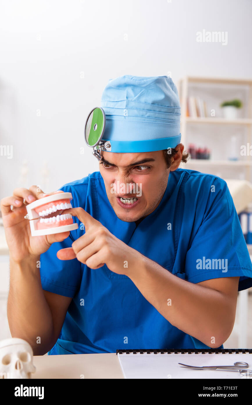 Mad doctor working in the clinic Stock Photo - Alamy