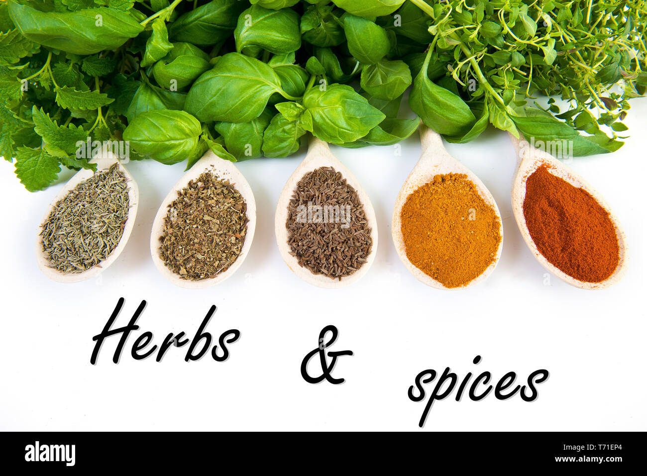 Dried and fresh spices on white background Stock Photo - Alamy