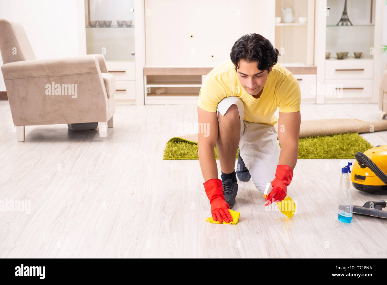 Handsome young man polishing hi-res stock photography and images - Alamy