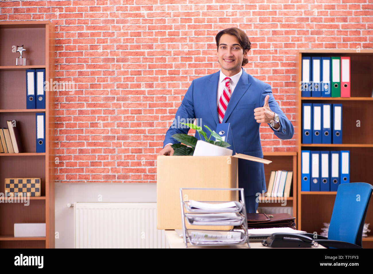 Successful employee getting new job position Stock Photo - Alamy