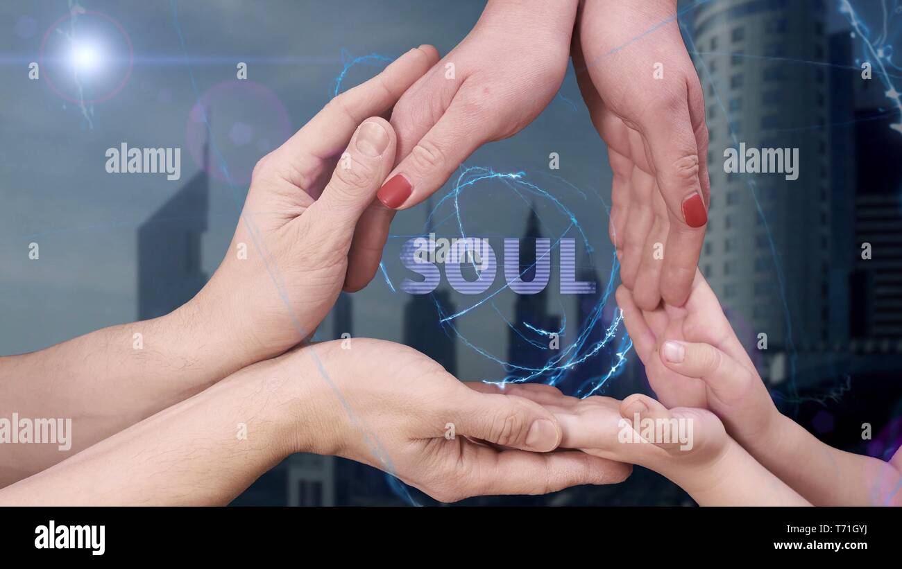 Men's, women's and children's hands show a hologram Soul Stock Photo ...