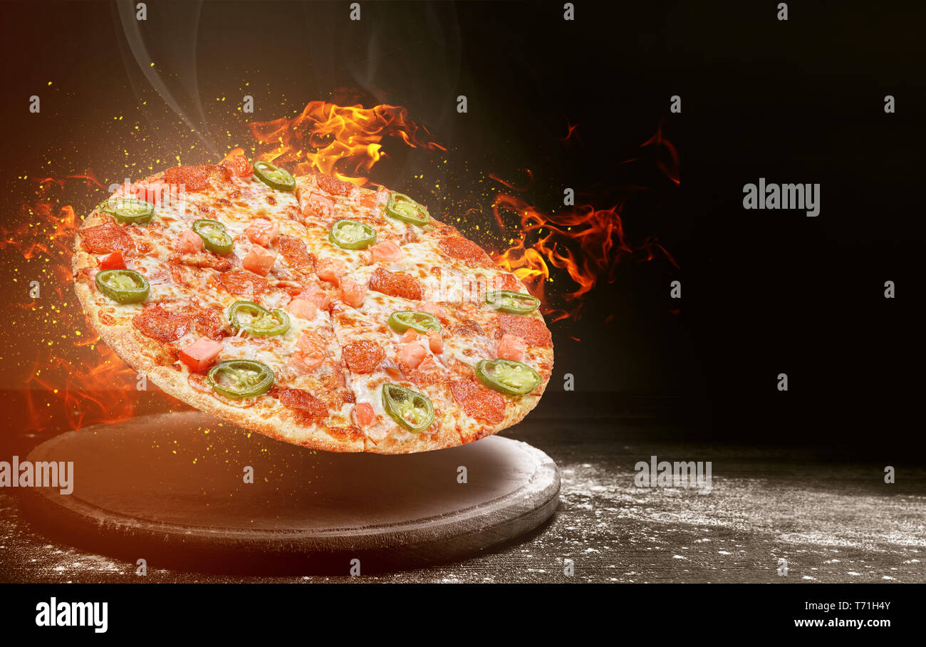 fast food pizza on fire. high quality fast food concept Stock Photo - Alamy