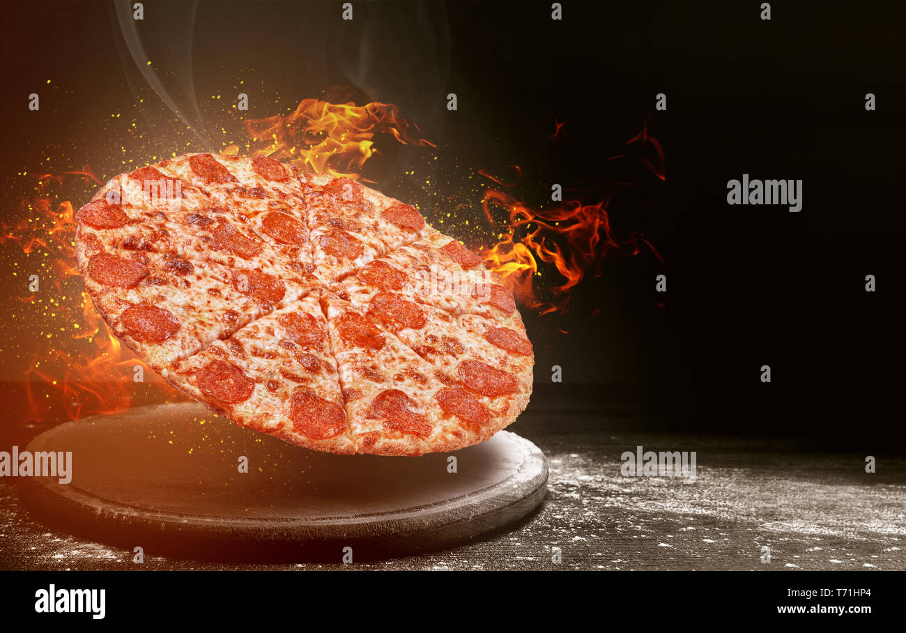 fast food pizza on fire. high quality fast food concept Stock Photo - Alamy