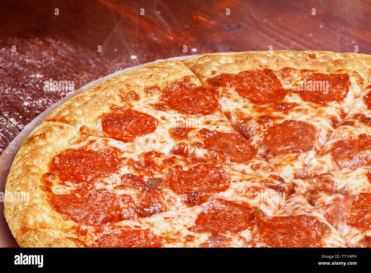 classic Italian pizza on a wooden tray, served in a small authentic ...