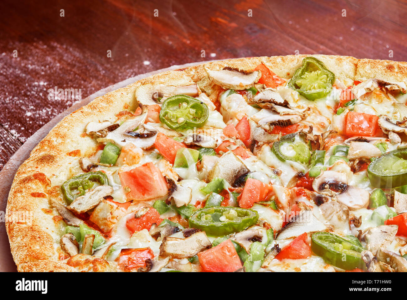 classic Italian pizza on a wooden tray, served in a small authentic ...