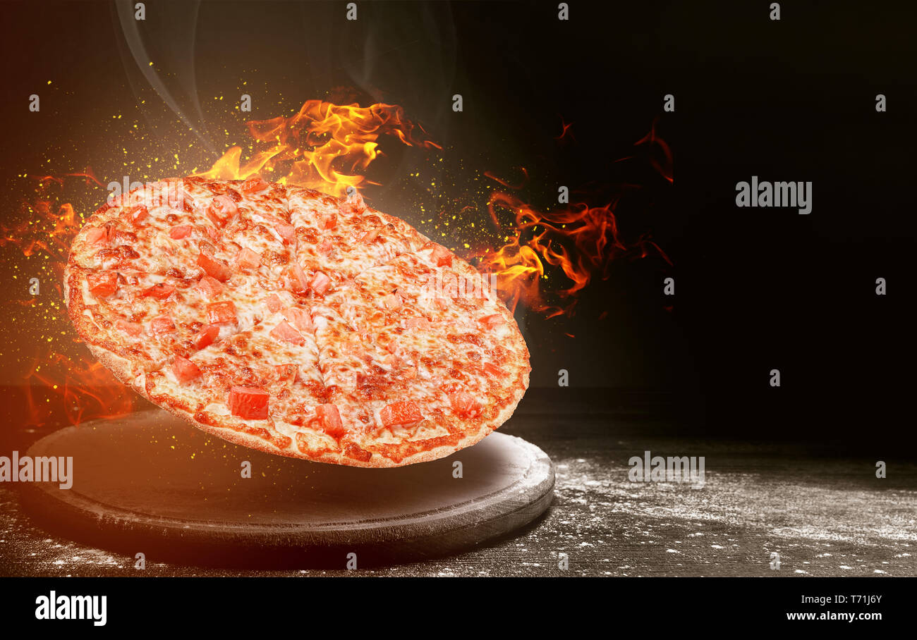 fast food pizza on fire. high quality fast food concept Stock Photo - Alamy