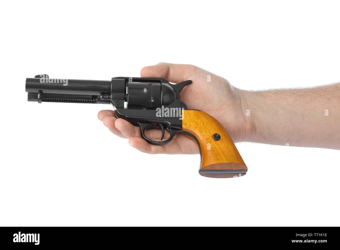 Hand with revolver Stock Photo - Alamy