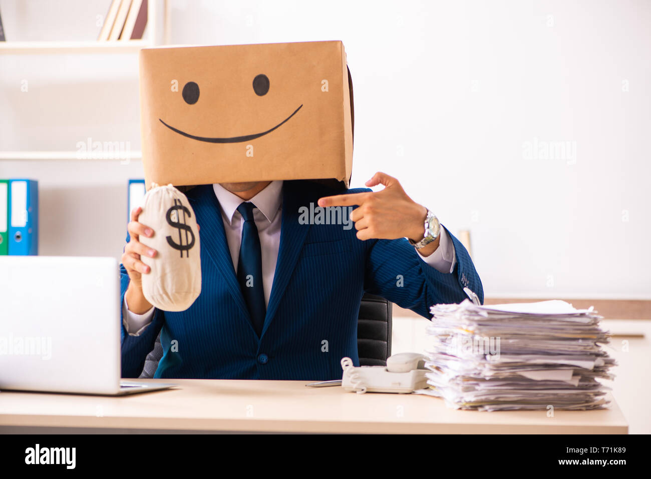 Happy man employee with box instead of his head Stock Photo - Alamy