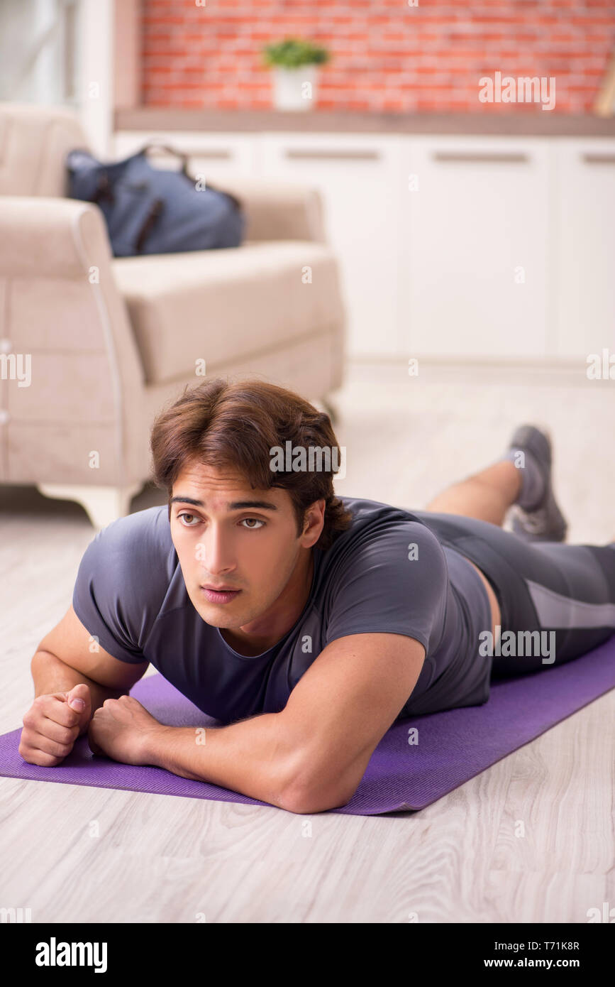 Young man training and exer hi-res stock photography and images - Alamy