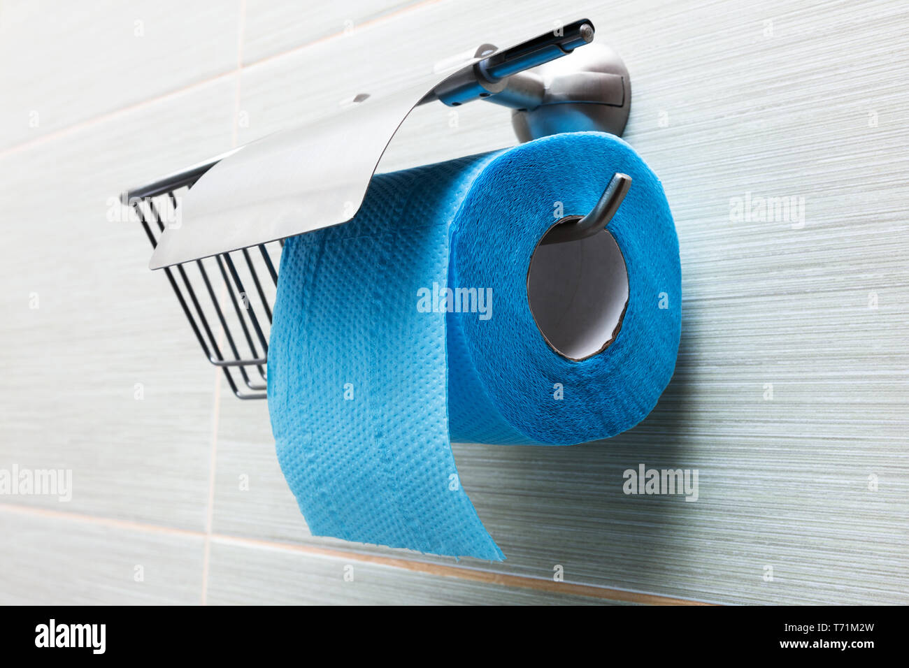 Toilet paper in horizontal hi-res stock photography and images - Alamy