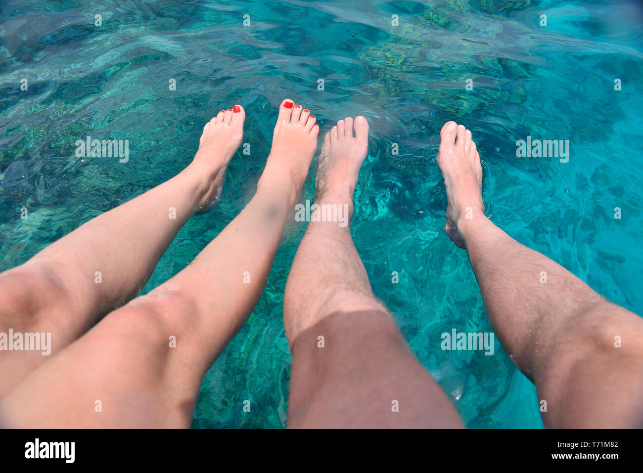 two pairs of legs Stock Photo - Alamy