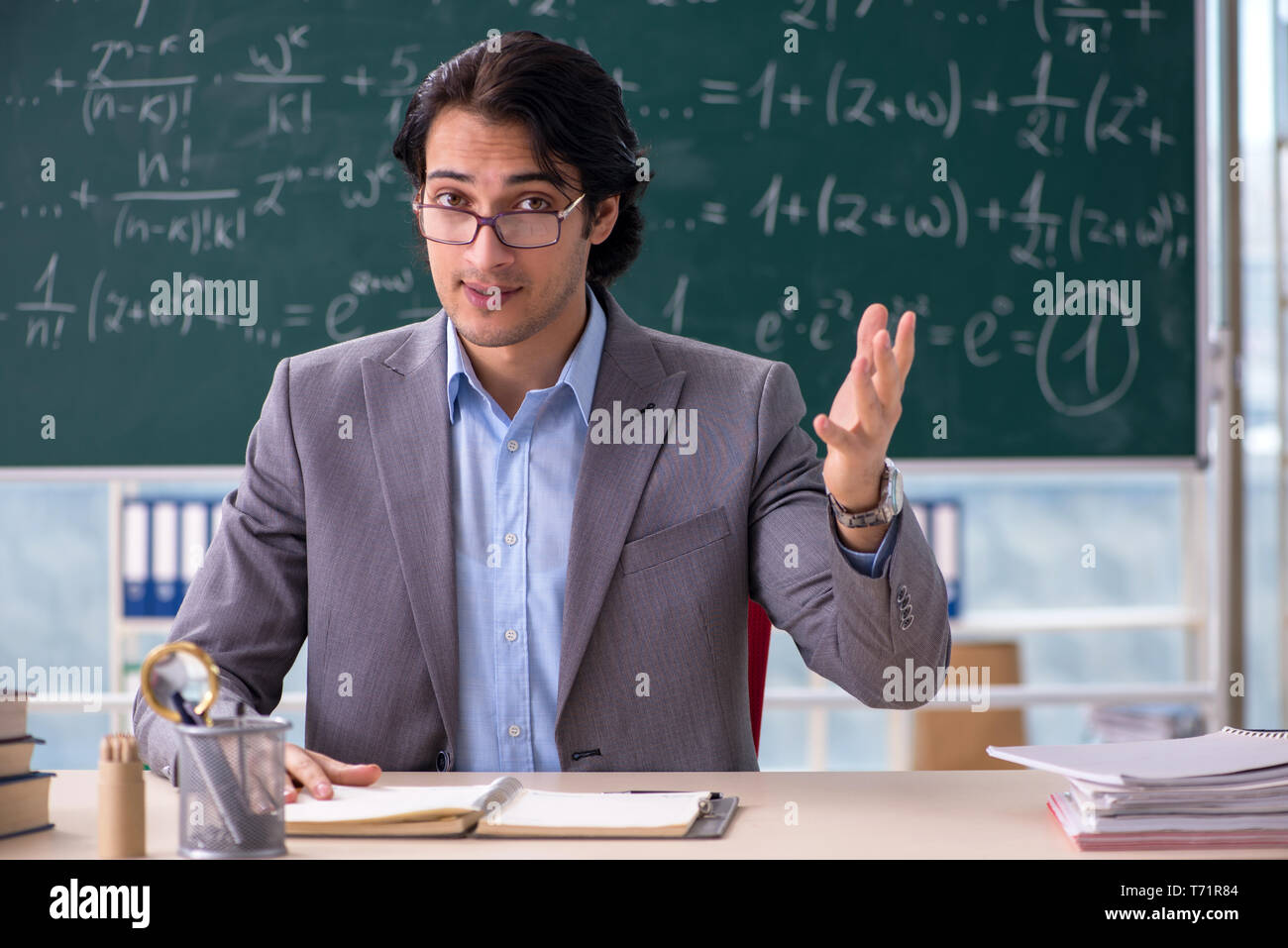 Young teacher physicist in hi-res stock photography and images - Alamy