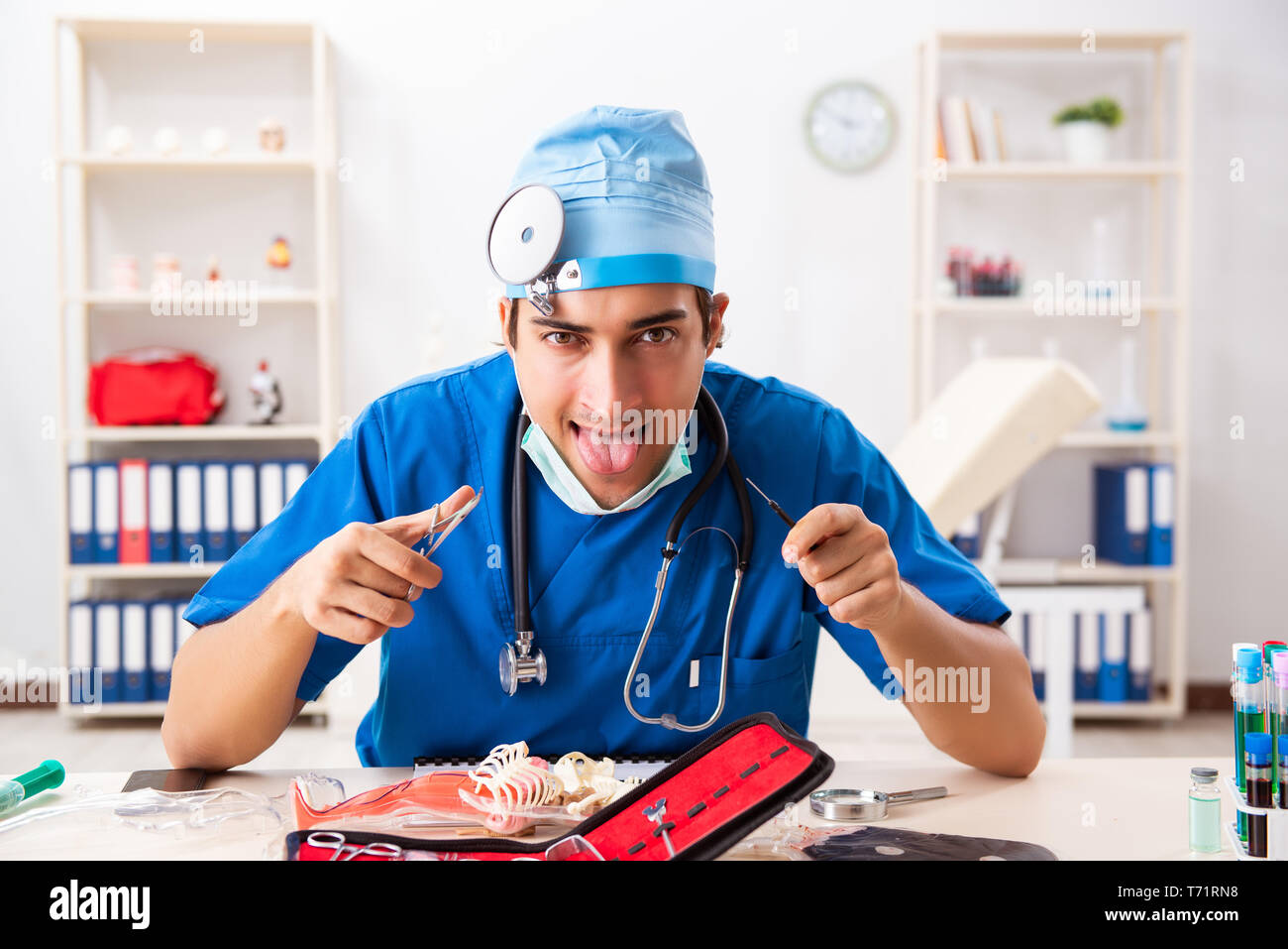 Doctor scissors fun hi-res stock photography and images - Alamy