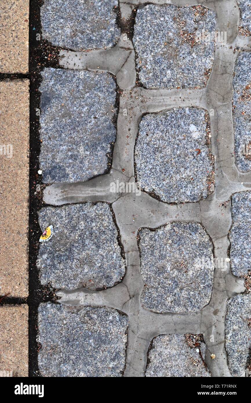 Detailed close views on cobblestone streets and sidewalks in different ...