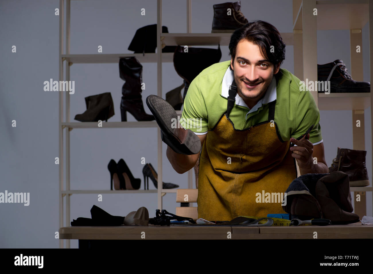 Happy shoemaker hi-res stock photography and images - Alamy