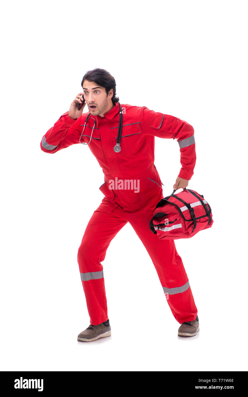 Young paramedic in red uniform isolated on white Stock Photo - Alamy