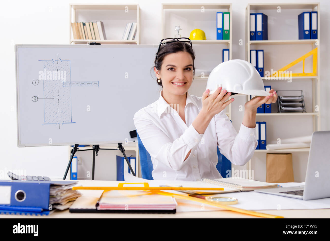 Female architect drafting blueprint ruler hi-res stock photography and ...