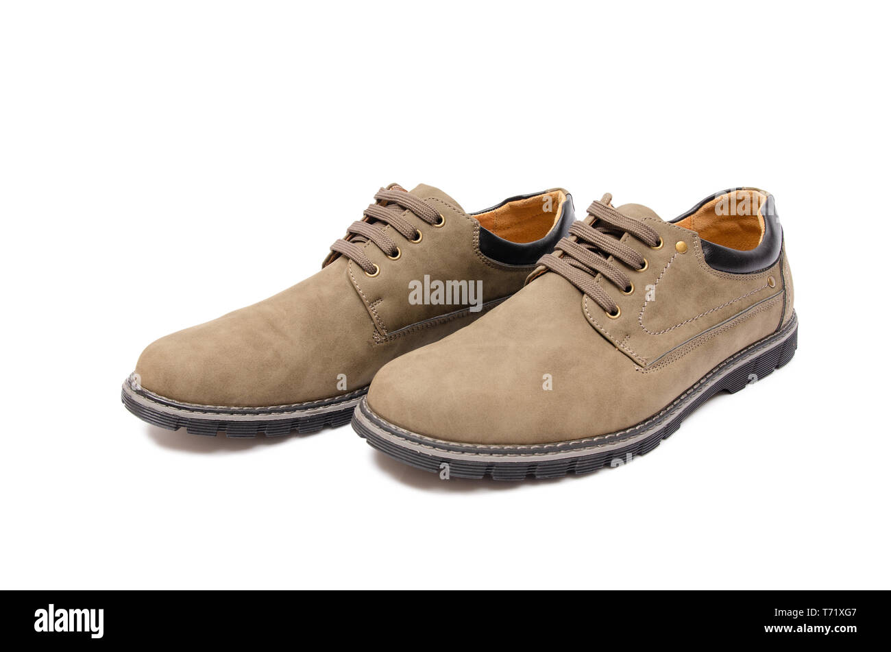 Brown suade shoes isolated on white background Stock Photo - Alamy