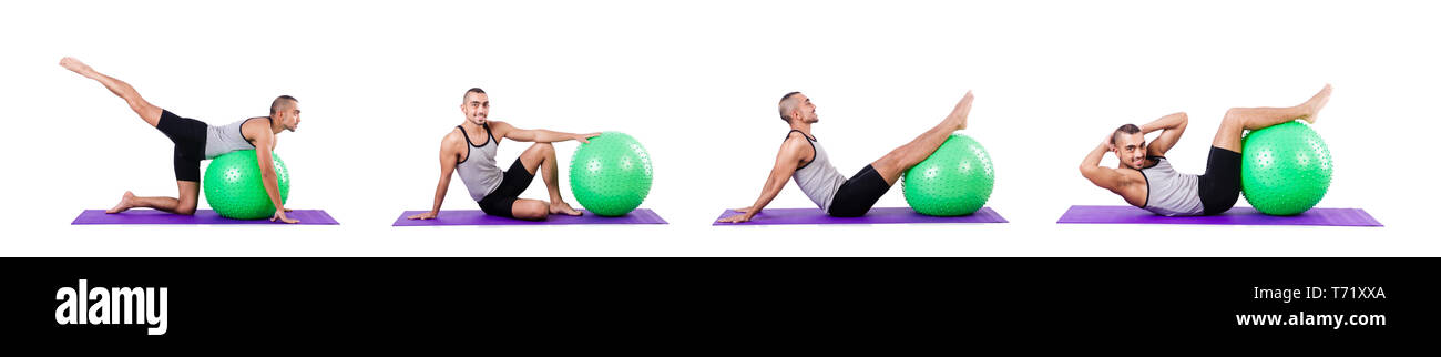 Man with swiss ball doing exercises on white Stock Photo - Alamy
