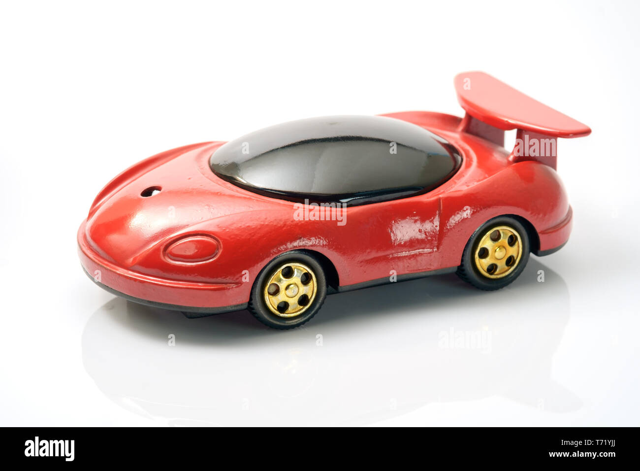 Toy red car on white background Stock Photo - Alamy