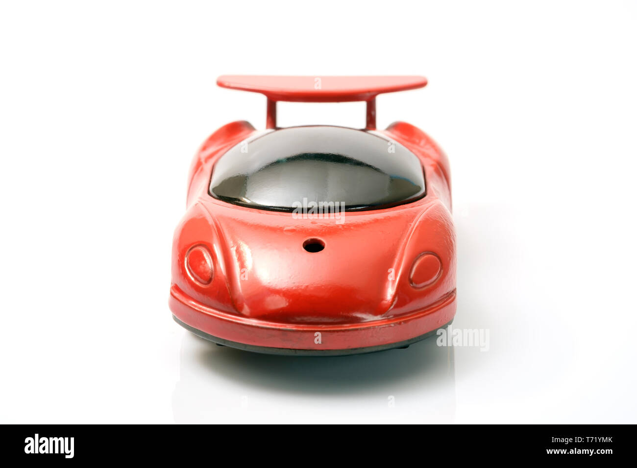 Toy red car on white background Stock Photo - Alamy
