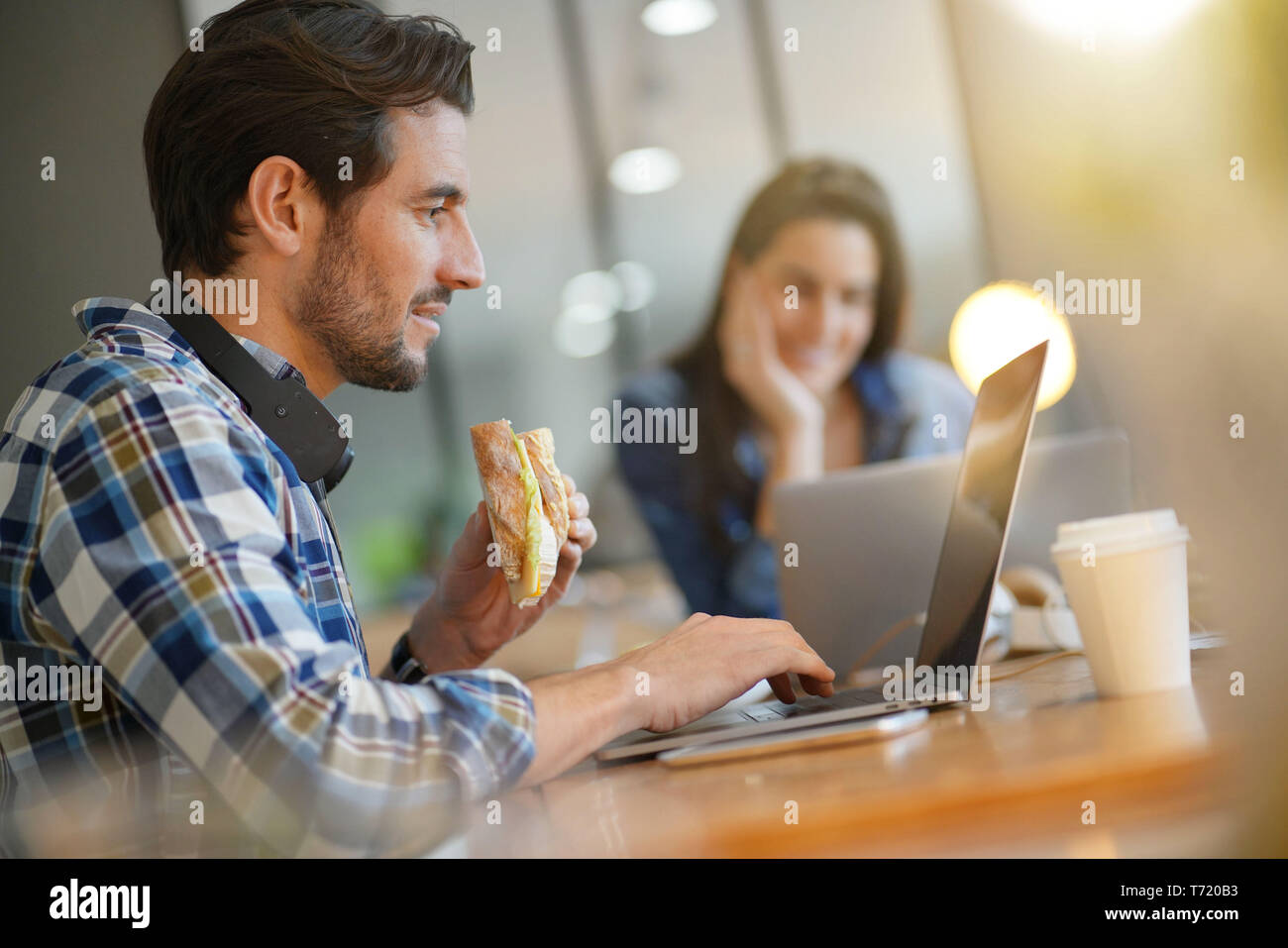 Man Eating Sandwich Work High Resolution Stock Photography and Images ...