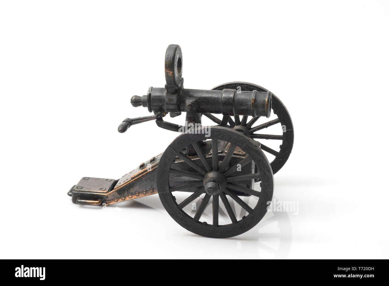 Vintage toy, cannon on white background Stock Photo - Alamy