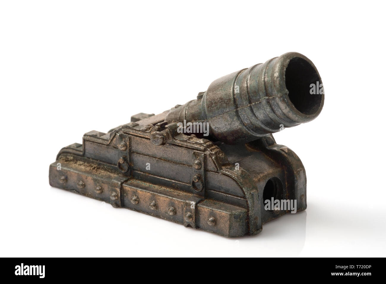 Vintage toy, cannon on white background Stock Photo - Alamy