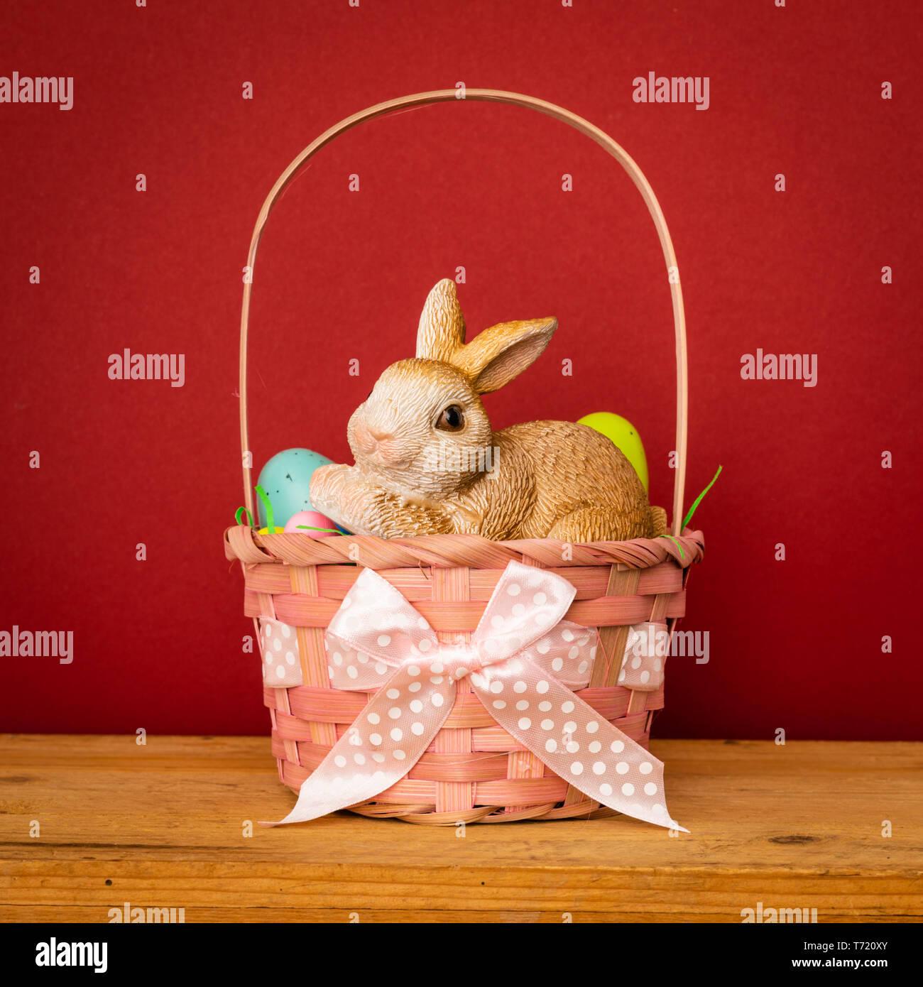 Easter bunny in basket hi-res stock photography and images - Alamy